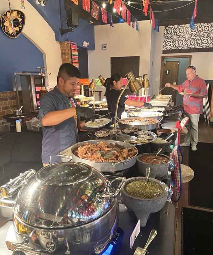 The buffet line gleams with fresh options that get replenished faster than you can say "one more plate."