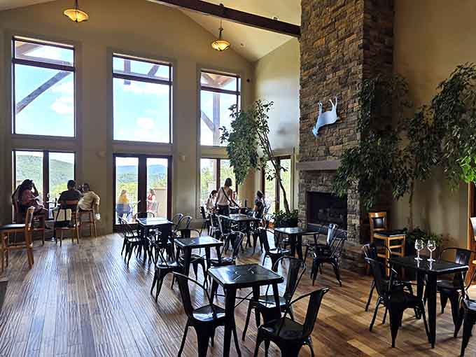 Floor-to-ceiling windows frame those views while you're tasting, because why choose between indoor comfort and outdoor beauty.