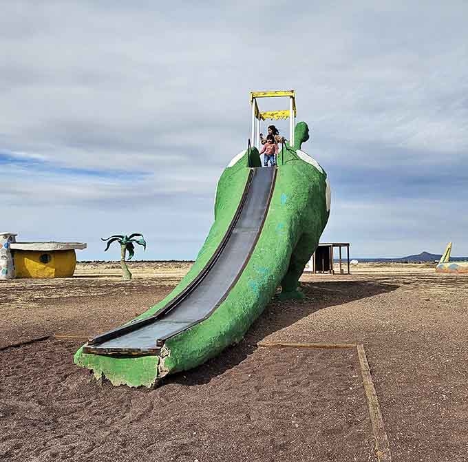 Climb aboard this brontosaurus slide and experience the joy of prehistoric playground equipment done absolutely right.