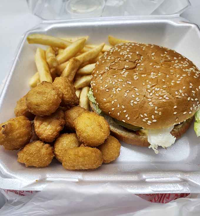 Hamburger with corn nuggets proving that golden fried things make everything better, no exceptions whatsoever here.