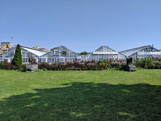 Multiple greenhouse structures stand ready to transport you to different climates without requiring a single passport.
