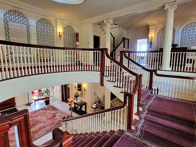 A grand staircase that makes you want to descend it dramatically while wearing your finest outfit.
