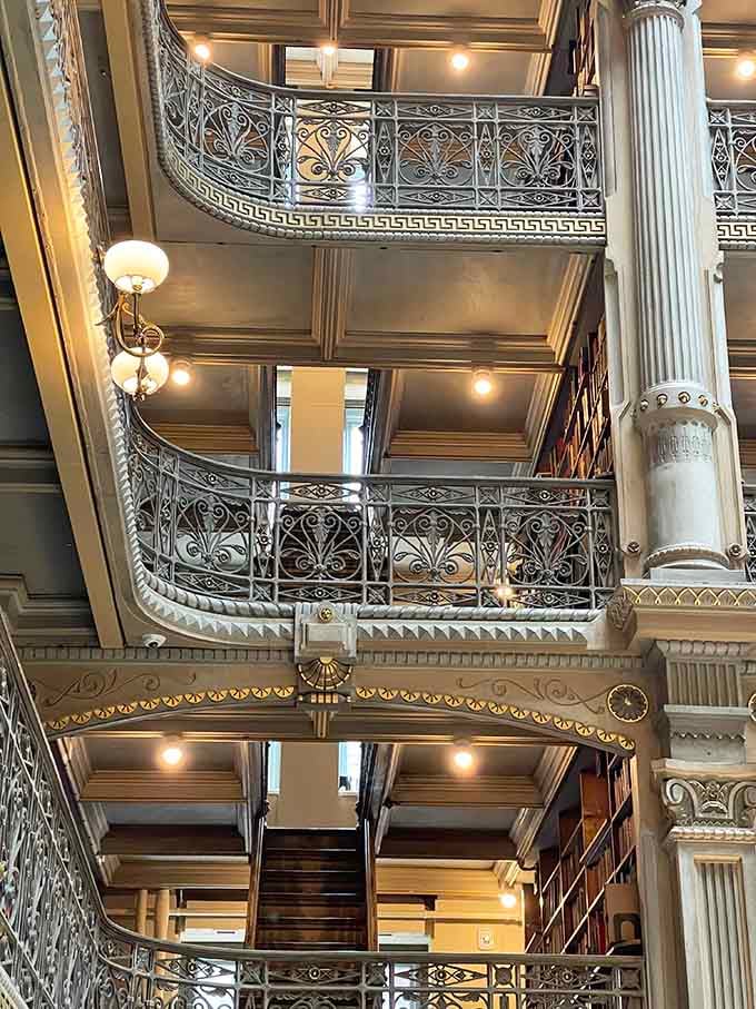 Cast iron balconies stack like an elegant layer cake, each tier more breathtaking than the last one below.