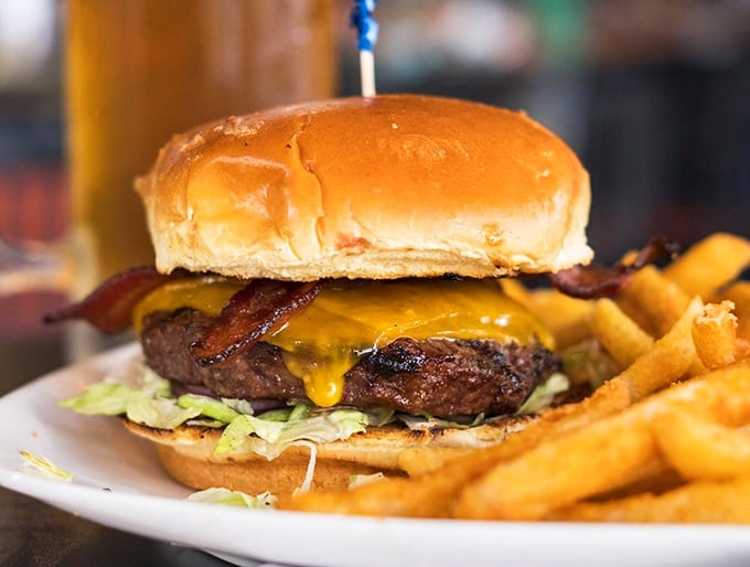 A bacon cheeseburger so juicy and perfectly constructed, it practically begs you to take that first bite.