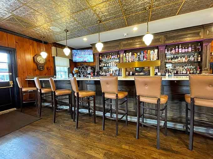A well-stocked bar with gleaming bottles promises the perfect complement to whatever culinary adventure you're planning.