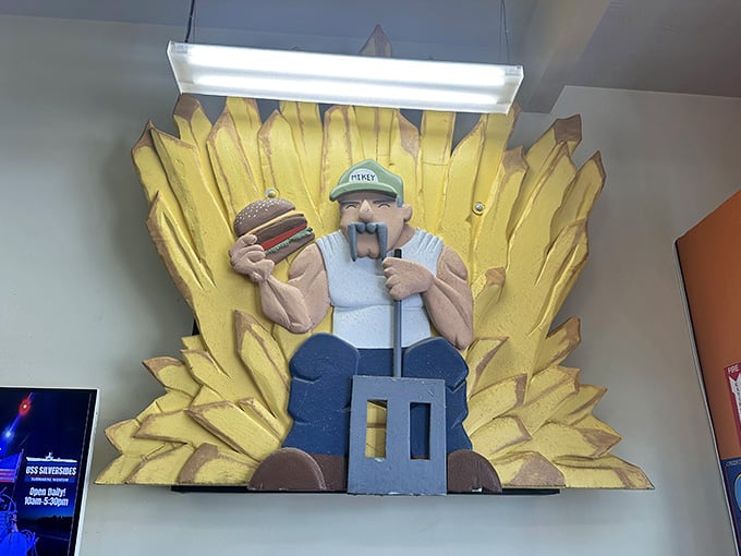 A throne made of fries fit for the burger king himself, proving this place has a sense of humor.