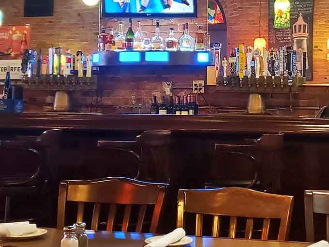 The well-stocked bar beckons with craft beers and cocktails, ready to complement your seafood selections perfectly.