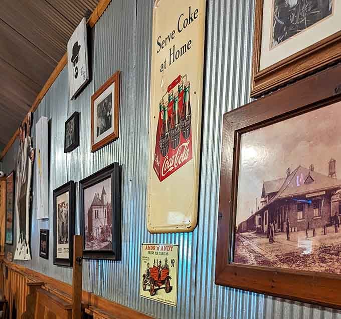 Vintage Coca-Cola signs and old photographs create a nostalgic backdrop that's authentic, not manufactured by some corporate design team.