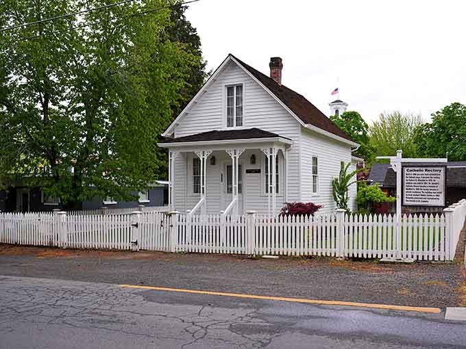 This pristine white cottage behind its picket fence looks like it wandered out of a storybook and decided to stay.