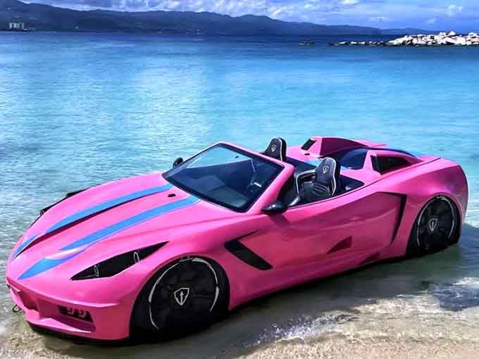 Hot pink against crystal waters, because if you're going to drive on the ocean, why not do it fabulously?