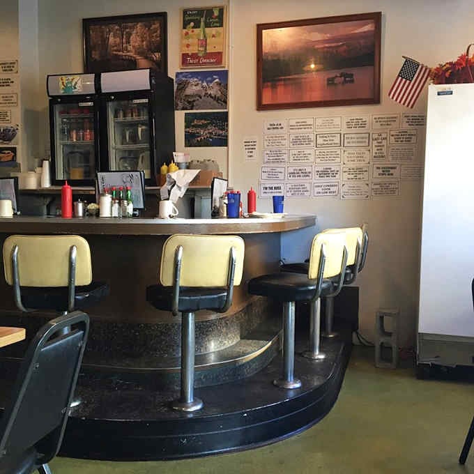 Those counter seats offer front-row views of breakfast magic happening right before your hungry eyes.