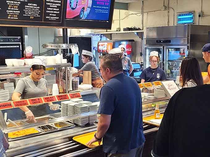 The ordering counter buzzes with anticipation as hungry folks prepare to experience smoky meat magic firsthand.