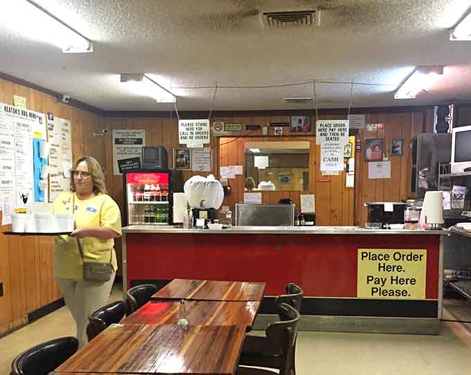 The order counter where magic begins, complete with clear instructions because good barbecue shouldn't be complicated.