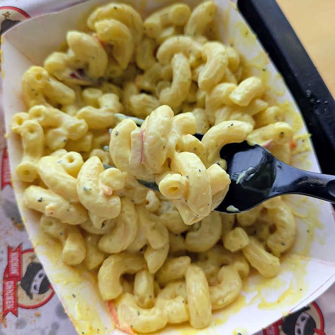 Creamy, peppery mac salad is the unsung hero that balances out all that gloriously crispy fried chicken.