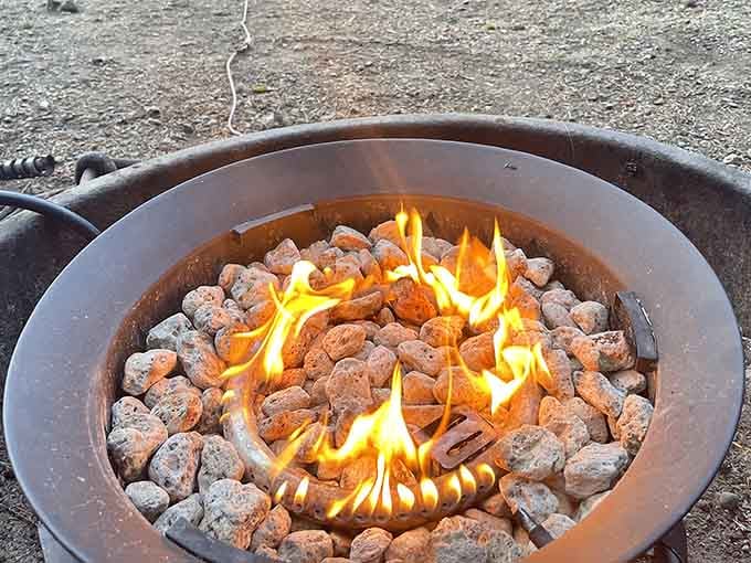 A crackling fire ring surrounded by stones is the original social media, bringing people together since forever.