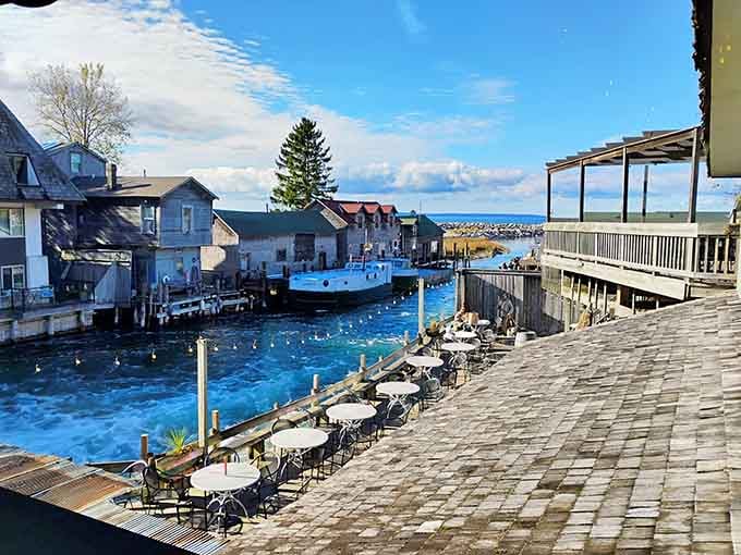 Waterfront dining at The Cove means watching boats drift by while savoring fresh, locally-caught whitefish.
