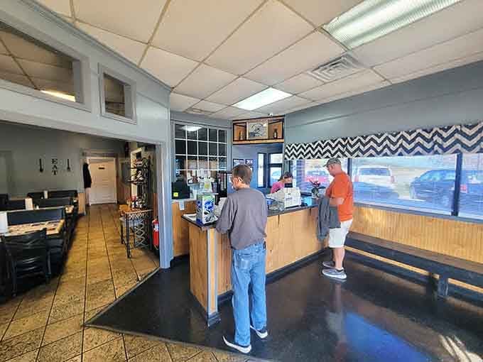 The counter where orders are placed and dreams of fried catfish begin, staffed by folks who genuinely care.