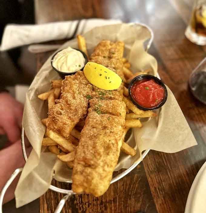 Golden, crispy fish and chips that would make any British pub jealous, served with all the fixings.