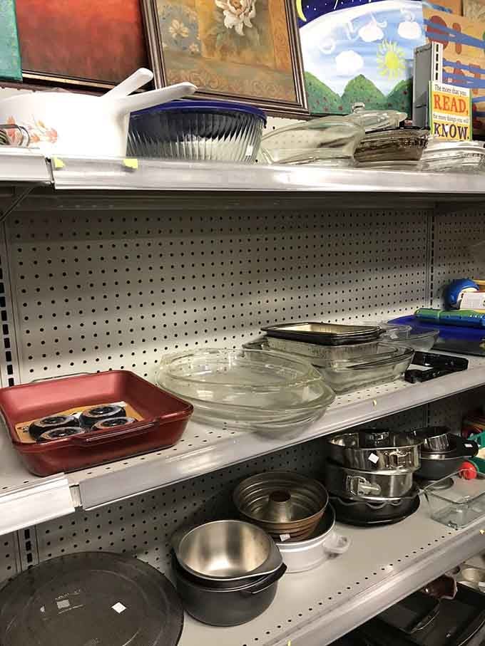 Kitchen essentials scattered across shelves, proving someone's clutter really is your culinary treasure waiting to happen.