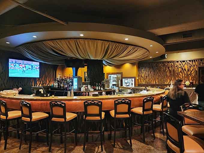 The circular bar invites conversation and cold drinks, two things that make any evening infinitely better than staying home.