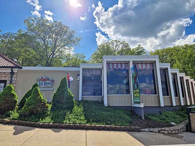 Topiary and toy trains create a whimsical world that proves fun doesn't have an age limit here.