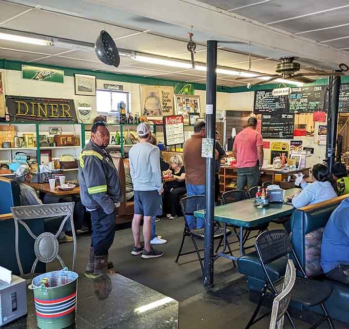 Real people enjoying real food in a real community gathering spot, exactly as dining should be.