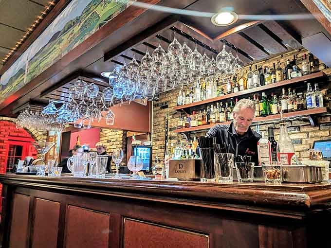 The bar gleams with promise, ready to craft cocktails the way your grandparents remember them being made.