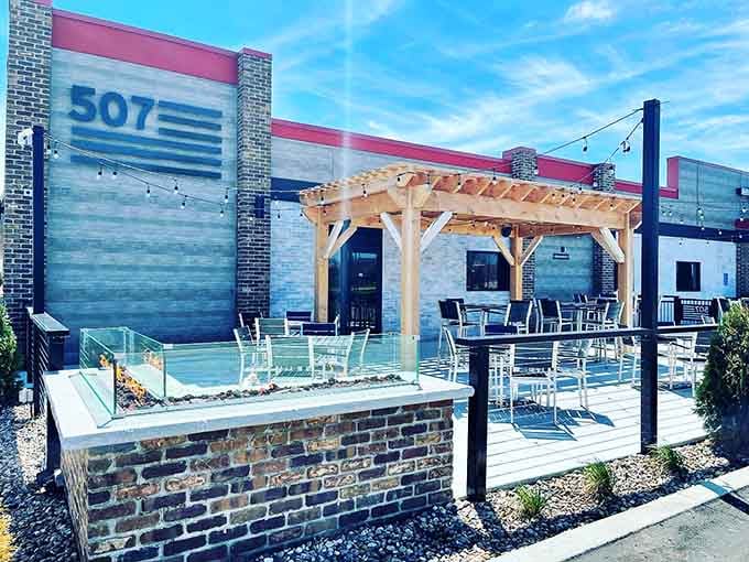 Tavern 507's patio looks like someone finally figured out how to make outdoor dining both stylish and actually comfortable.
