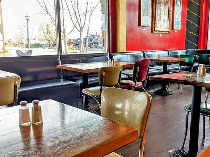 Colorful chairs and cozy booths create the perfect spot to settle in and savor every single delicious bite.