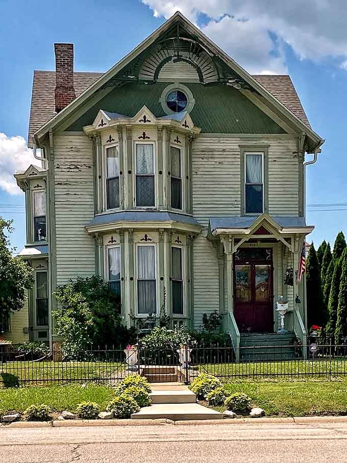 Green trim and Victorian charm combine to create the kind of house that makes you wonder why we stopped building beautiful things.