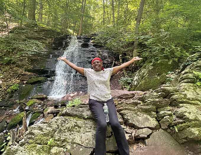 Pure joy captured at the waterfall, the kind of happiness that only comes from discovering hidden natural treasures close to home.