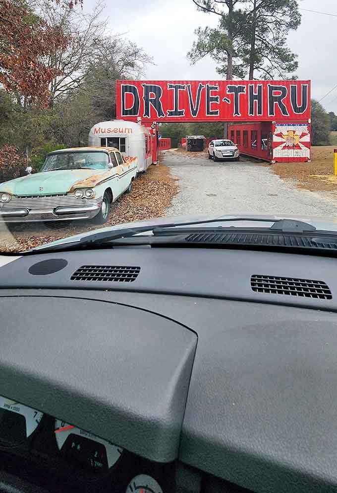 Your dashboard frames the adventure ahead, where a classic car and bold signage promise an experience unlike any other museum visit.