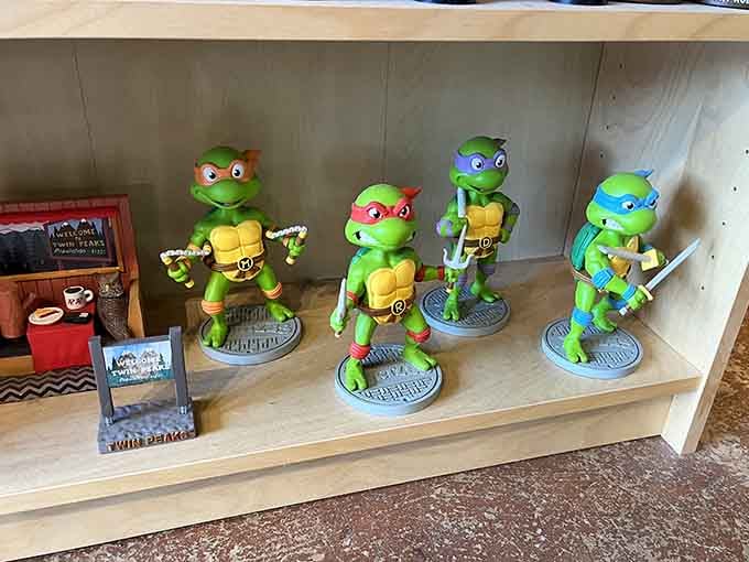 The Teenage Mutant Ninja Turtles stand ready to defend your shelf space with their weapons and spring-mounted turtle power.