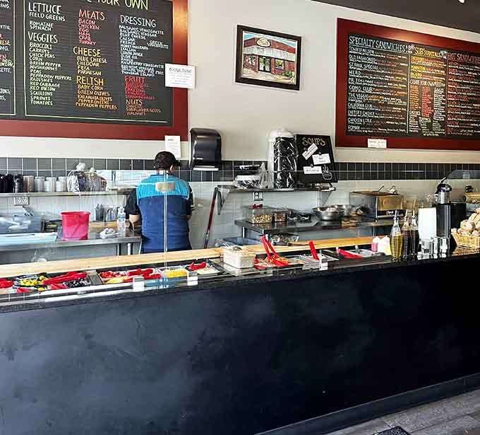 The salad bar setup shows serious attention to freshness, with toppings that actually look like they want you.
