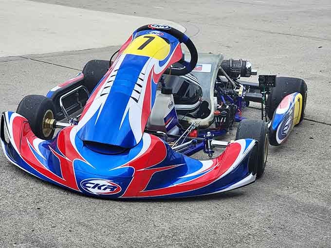 Racing karts feature colorful designs that make them look fast even when they're standing still.