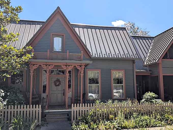Victorian gingerbread trim and white picket fences create the kind of storybook scene that makes you reach for your camera.