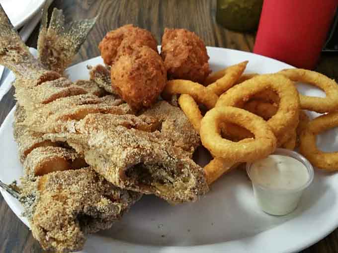 Catfish with those golden onion rings proves that sometimes going big is absolutely the right decision today.