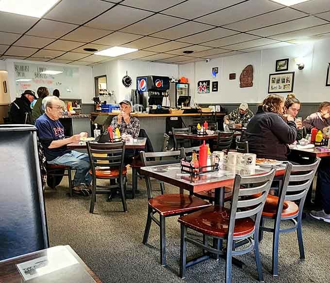 A full dining room of happy people. This is what a community gathering place actually looks like.