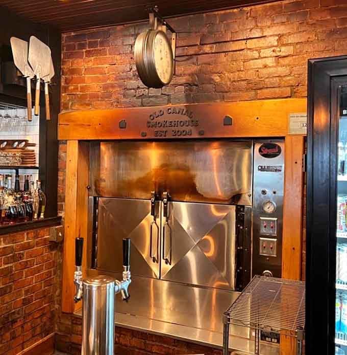 The Old Canal Smokehouse smoker, where the real magic happens and meat transforms into something transcendent and delicious.