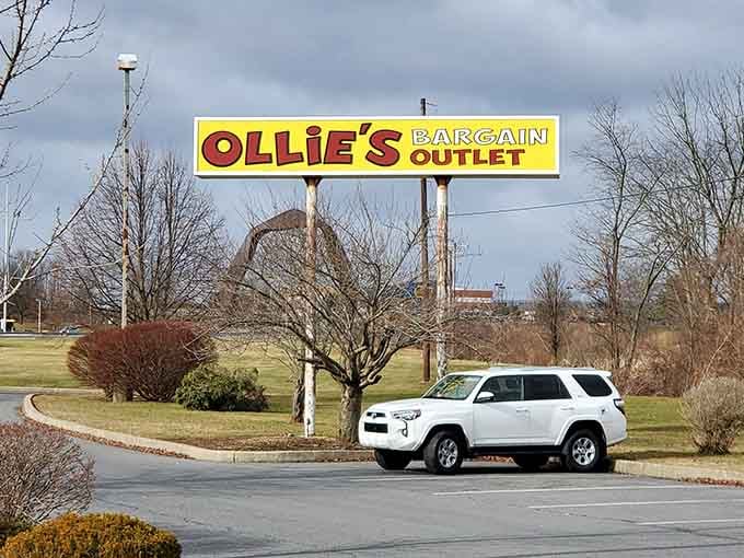 The sign beckons from the roadside like a beacon of hope for budget-conscious shoppers everywhere.