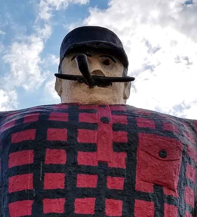 Looking up at Paul's stoic face, you understand why tall tales needed an equally tall protagonist.