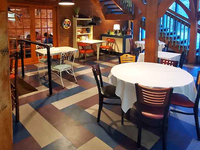 Checkered floors and white tablecloths strike that perfect balance between casual comfort and dressed-up dining done right.