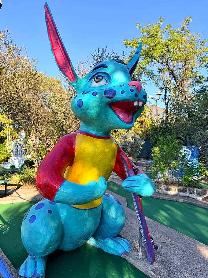 Meet the happiest rabbit in Texas, forever frozen mid-hop and clearly more excited about mini-golf than anyone should be.