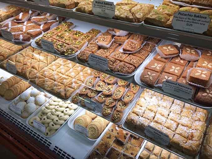 Pastries glisten with honey and nuts, each piece a sweet ambassador from distant dessert traditions.