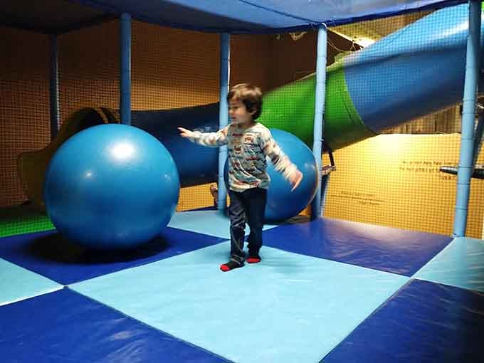 Blue balls scattered everywhere complete the ocean floor aesthetic while giving toddlers something harmless to throw around gleefully.