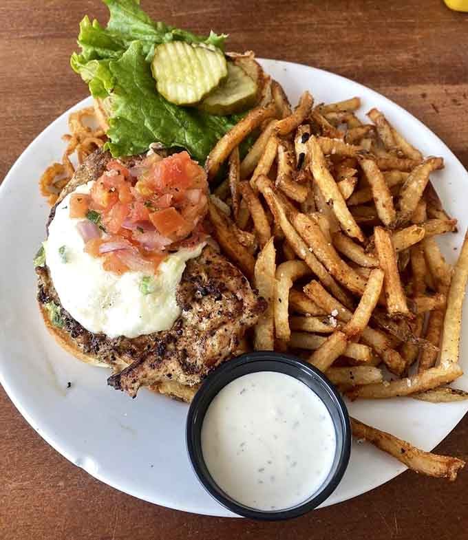 This chicken burger topped with pico de gallo shows creativity isn't limited to Poe's dark imagination here.