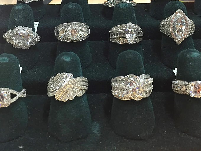 Sparkling rings displayed on velvet, each one carrying stories of proposals, anniversaries, and love that endured through decades.