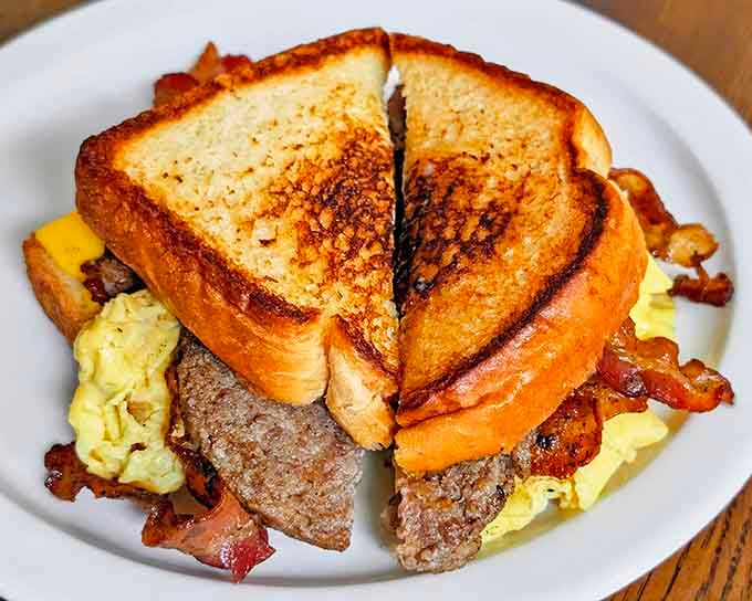 This breakfast sandwich is what happens when toast, eggs, meat, and cheese form a delicious alliance.