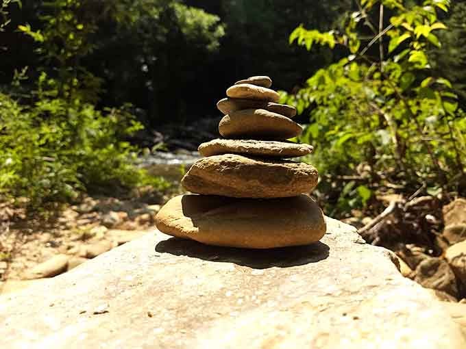 Someone's zen rock tower stands as proof that this place inspires creativity and inner peace.