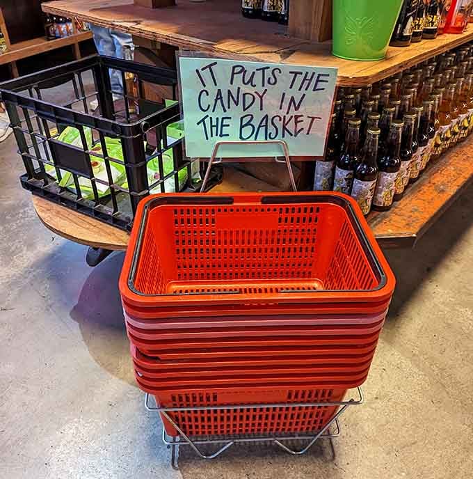 Red baskets await your sugary selections, ready to carry more treats than you originally planned to buy.